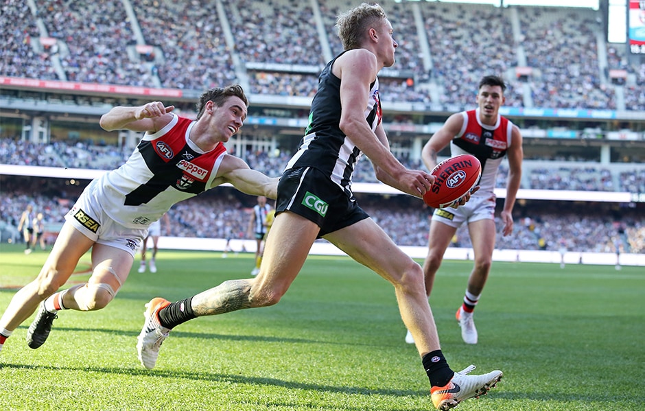 Pies surge past brave Saints